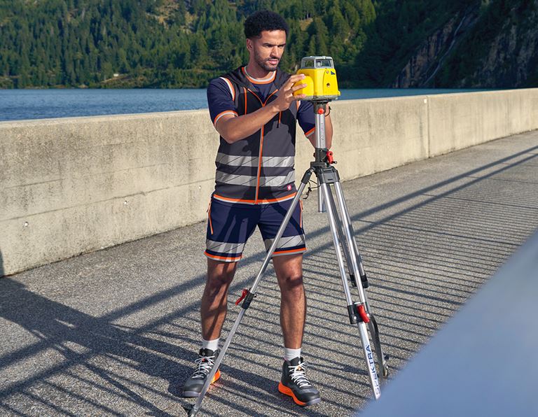 Reflex functional bodywarmer e.s.ambition navy/high-vis orange | Strauss